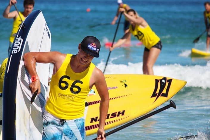 Get into water sports with paddle boarding - Activ4 school tours