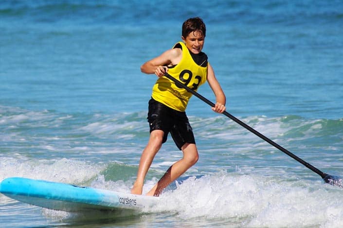 Get into water sports with paddle boarding - Activ4 school tours